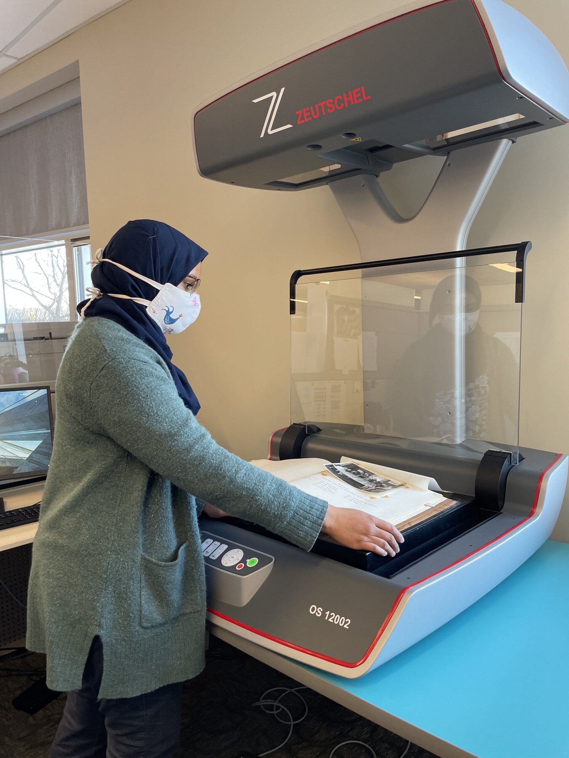 12002 Overhead Scanner Increases Digital Access at Milton Public Library